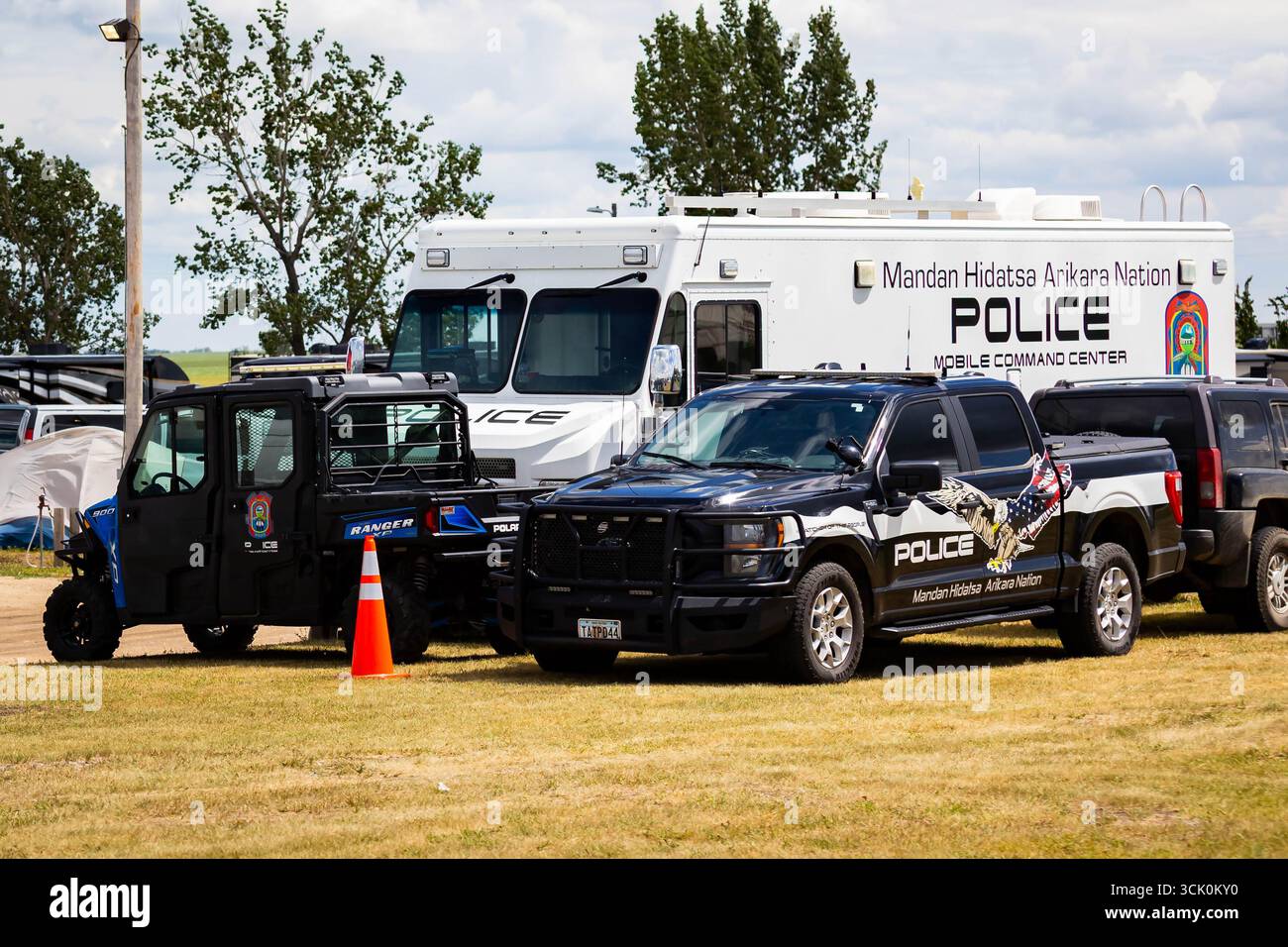 White Shield, ND, USA - July 11 2025: A fleet of Native American police ...