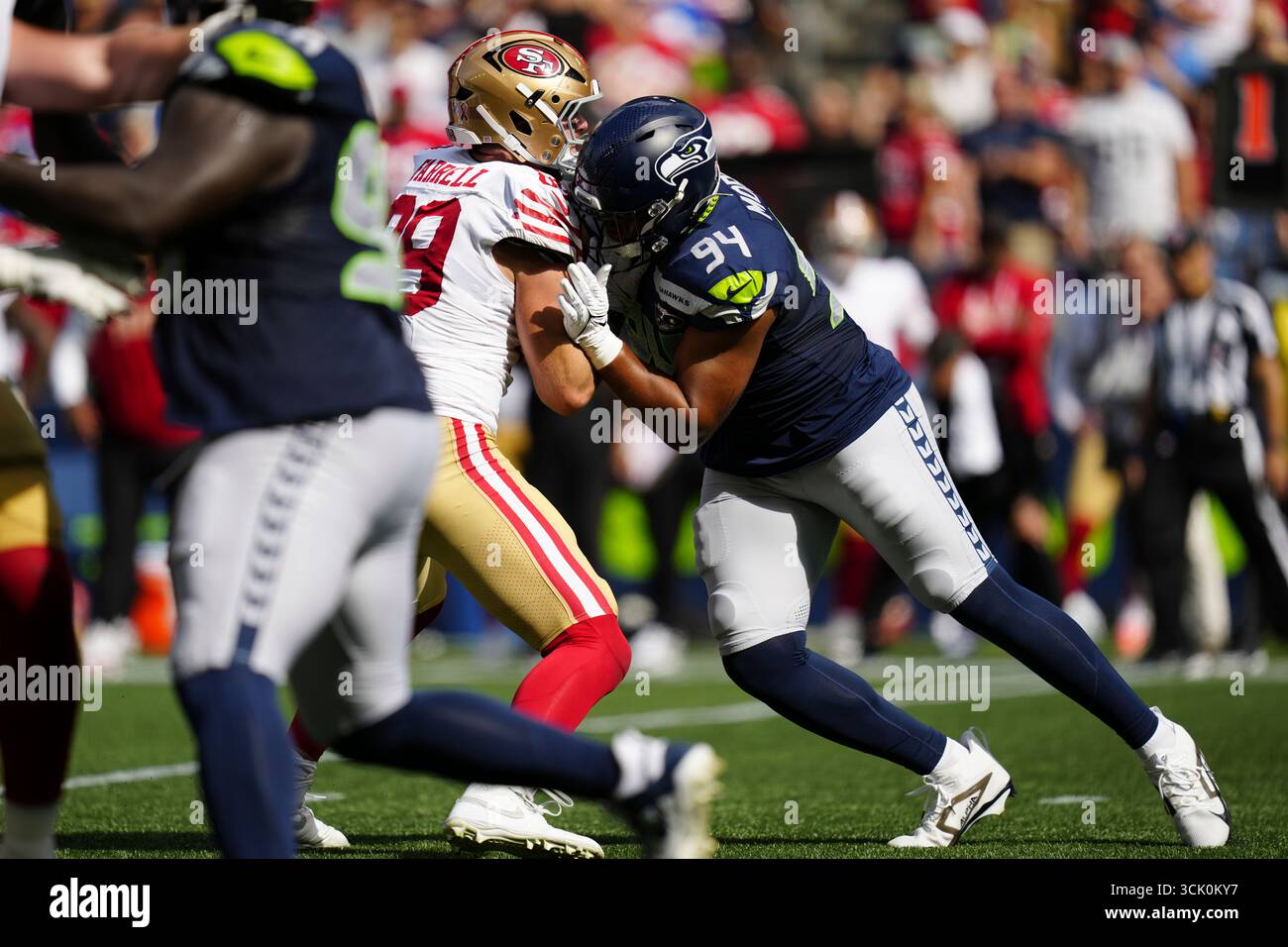 Seattle Seahawks defensive end Mike Morris (94) and San Francisco 49ers ...