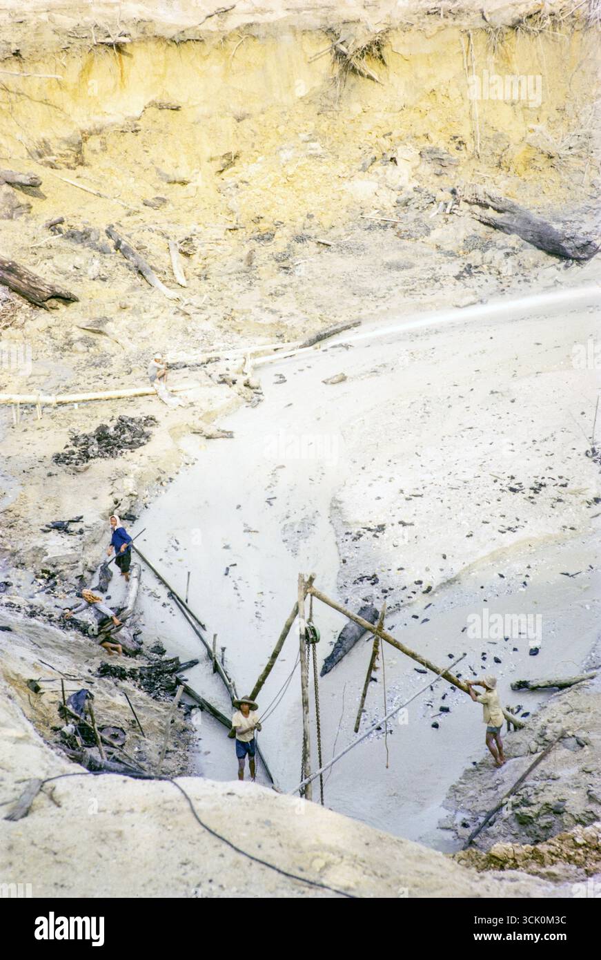 Open Cast gravel-pumping tin mine Malaya, Malaysia, south east Asia ...