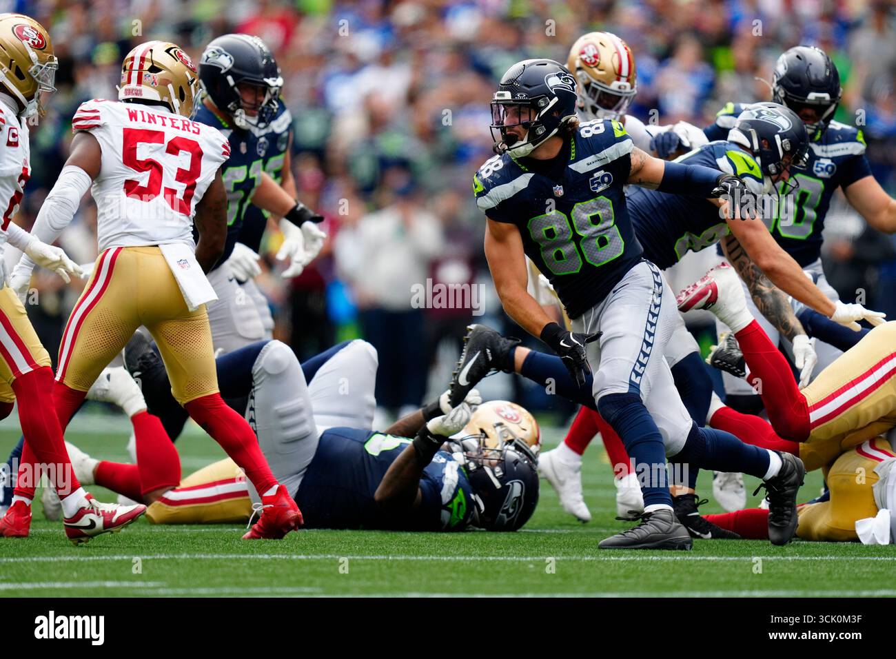 Seattle Seahawks tight end AJ Barner (88) runs down the field during an ...
