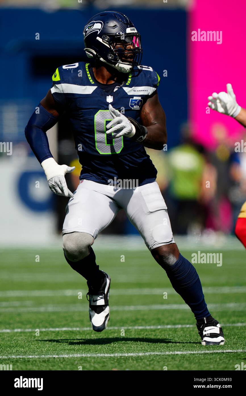 Seattle Seahawks defensive end DeMarcus Lawrence (0) looks on during an ...