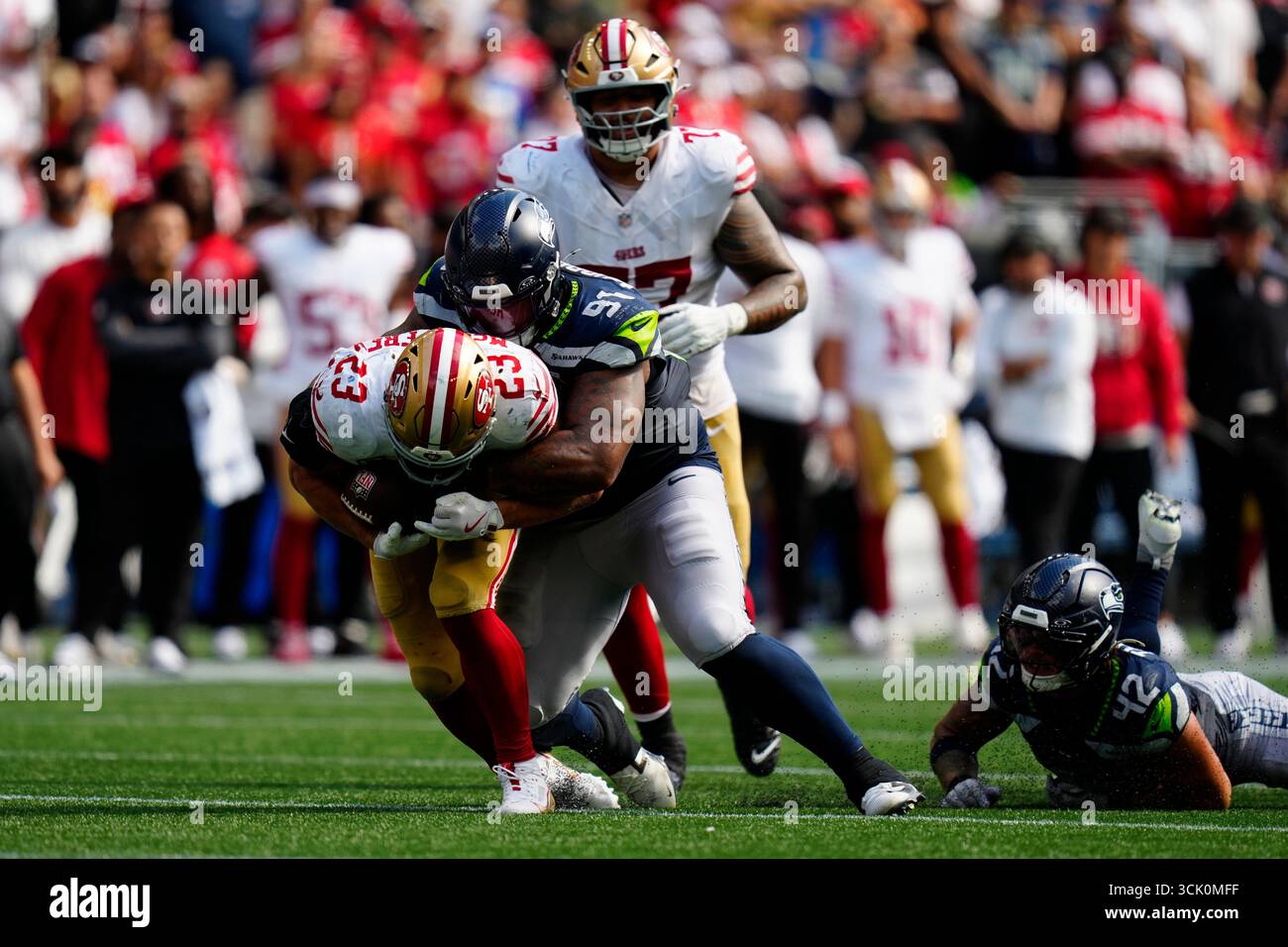Seattle Seahawks defensive tackle Byron Murphy II (91) tackles San ...