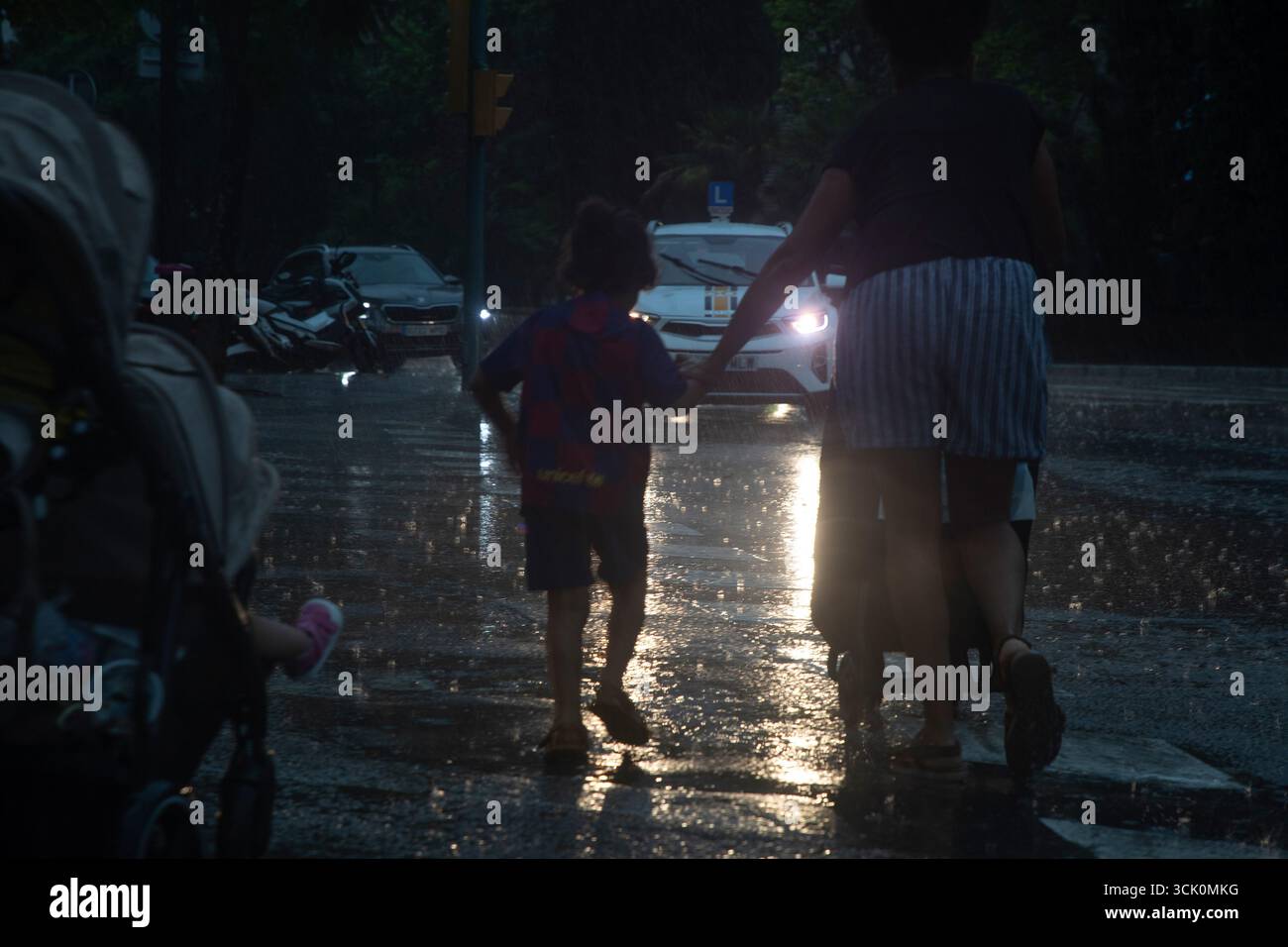 09 September 2025, Spain, Palma: People go for a walk in Palma on a ...