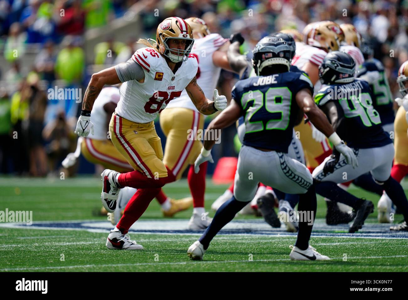 San Francisco 49ers tight end George Kittle (85) and Seattle Seahawks ...