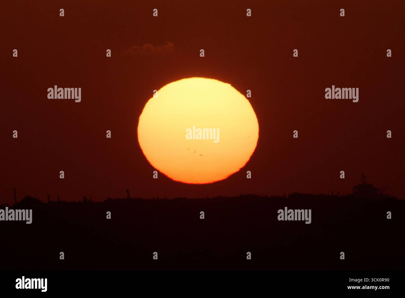 The sun set over Gaza Strip as seen from southern Israel, Tuesday, Sept ...