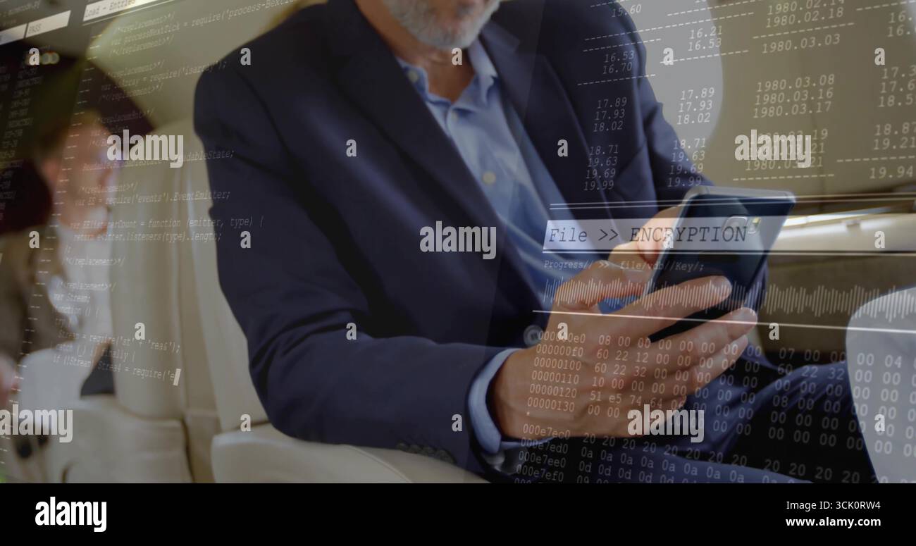 Tapping bearded executive man in suit using tablet in aircraft cabin ...