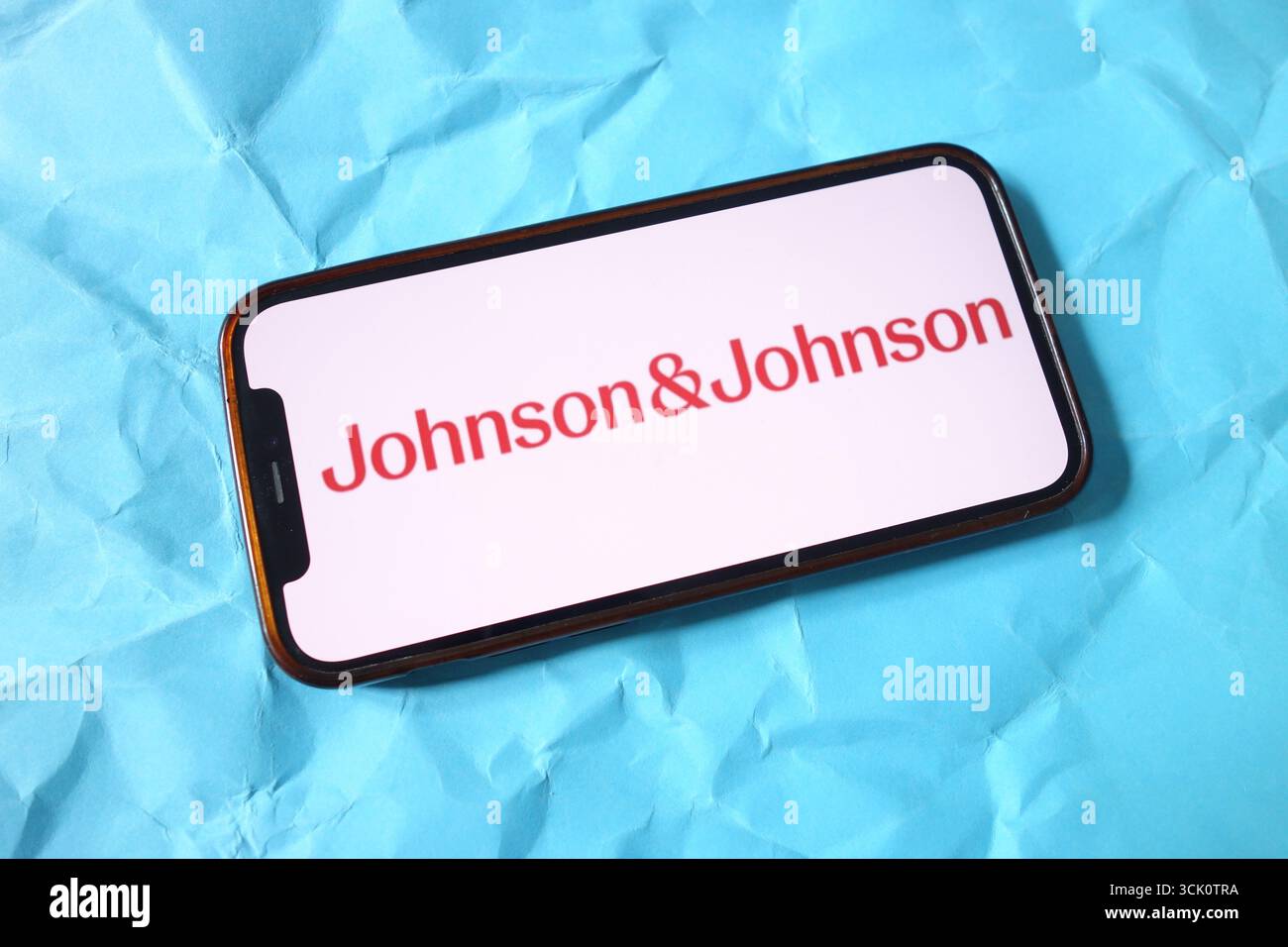 In this photo illustration, the Johnson and Johnson company logo is ...