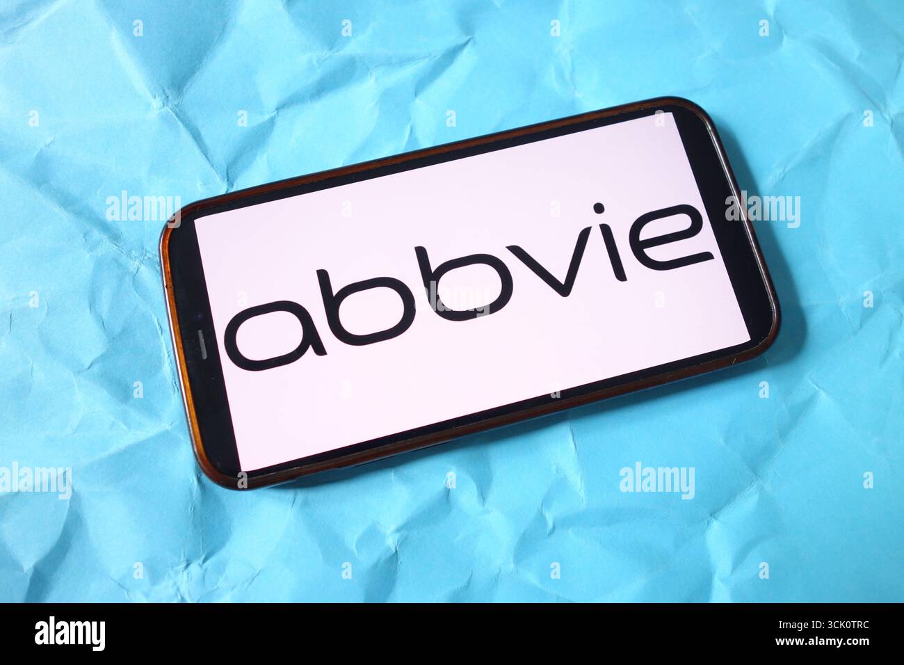 In this photo illustration, the AbbVie company logo is seen displayed ...