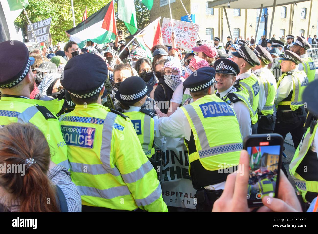 London, UK. 9th September 2025. Police officers push back pro-Palestine ...