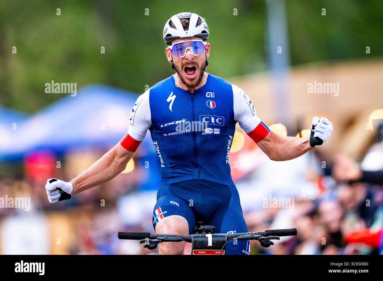 Victor Koretzky of France crosses the finish line to win the UCI MTB ...