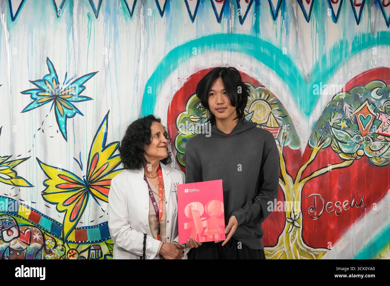 U.S. influencer Ethan Guo, right, stands with Marcela Zubieta, director ...
