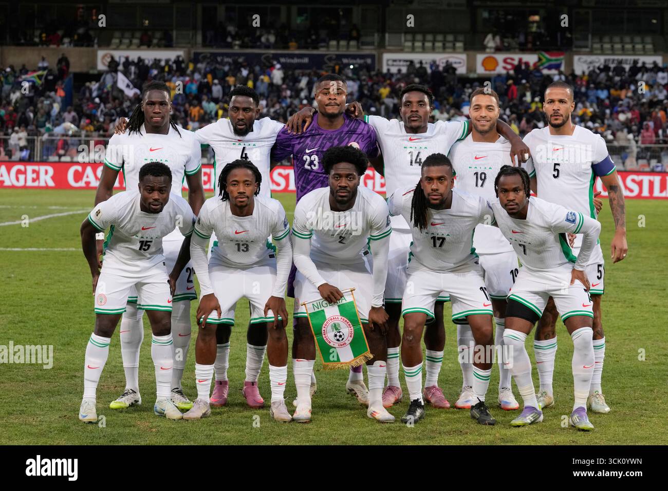 Nigeria's players pose for photographers warm up prior to the start of ...