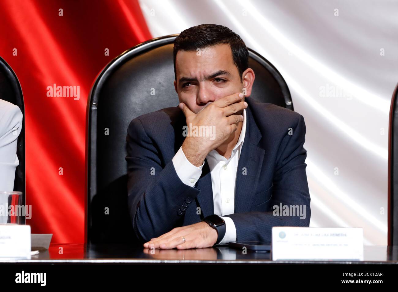 Deputy Elias Lixa Abimerhi, looks on during a session for the Reception ...