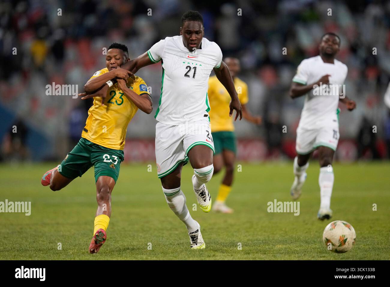 Nigeria's Calvin Bassey, right, challenges for the ball with South ...