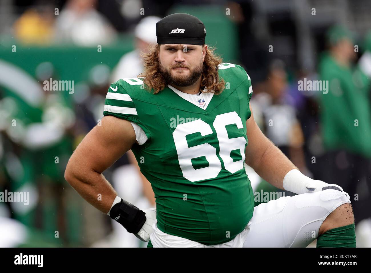 New York Jets center Joe Tippmann (66) warms up before an NFL football ...