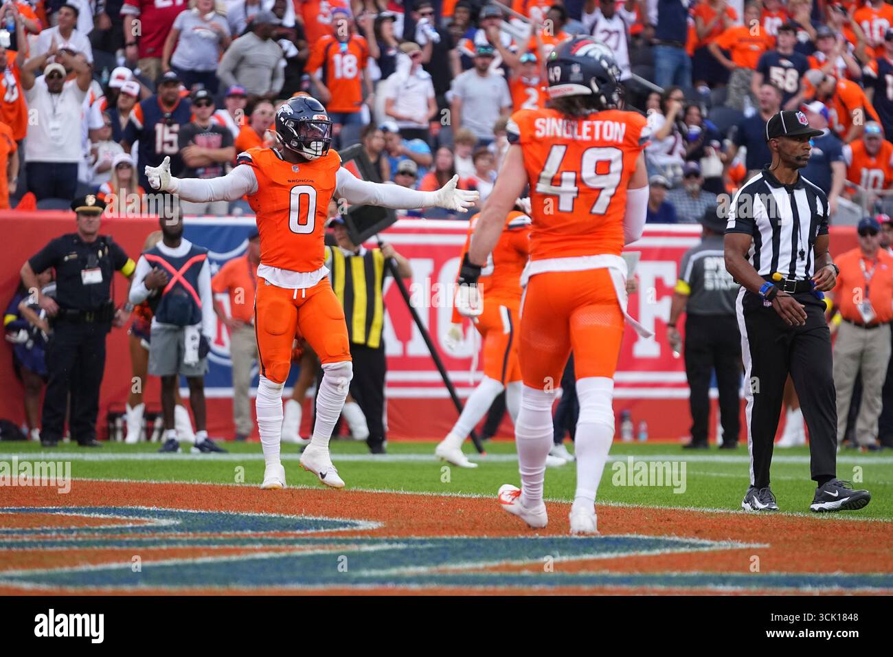 Denver Broncos linebacker Jonathon Cooper (0) and Denver Broncos ...