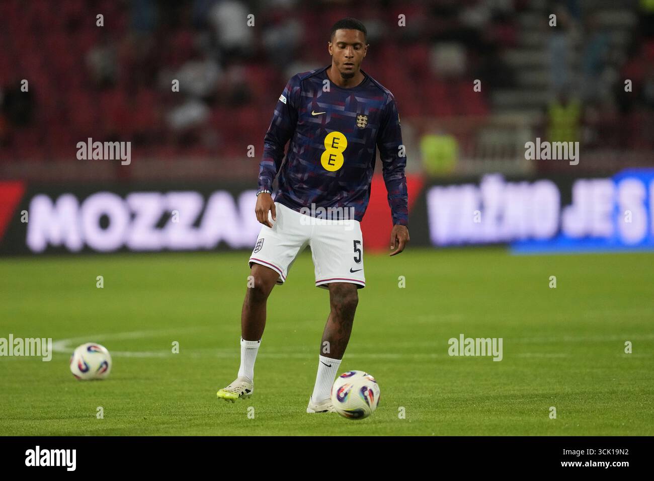 England's Ezri Konsa warms up before the World Cup Group K qualifying ...