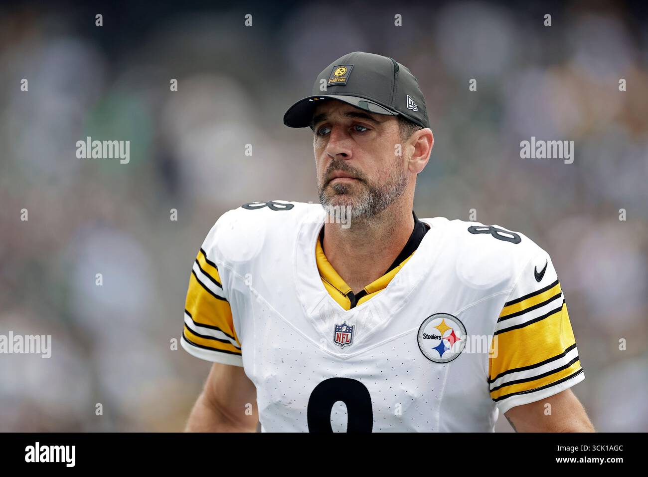 Pittsburgh Steelers quarterback Aaron Rodgers (8) runs off the field ...