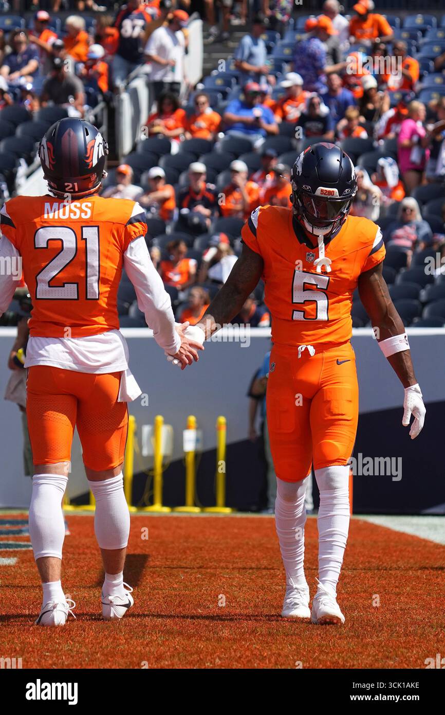 Denver Broncos cornerback Riley Moss (21) and Denver Broncos wide ...