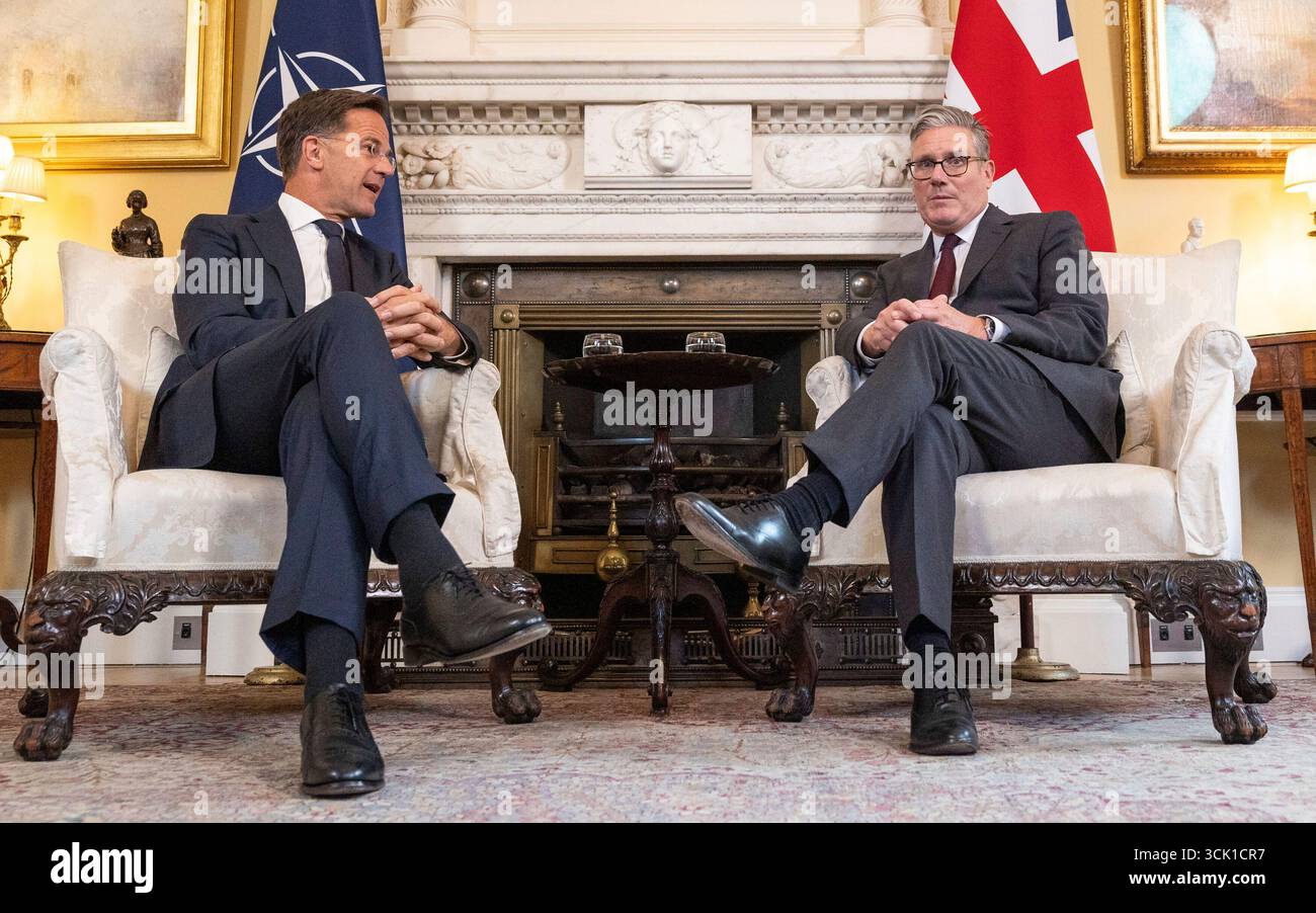 Britain's Prime Minister Sir Keir Starmer, right, and NATO Secretary ...