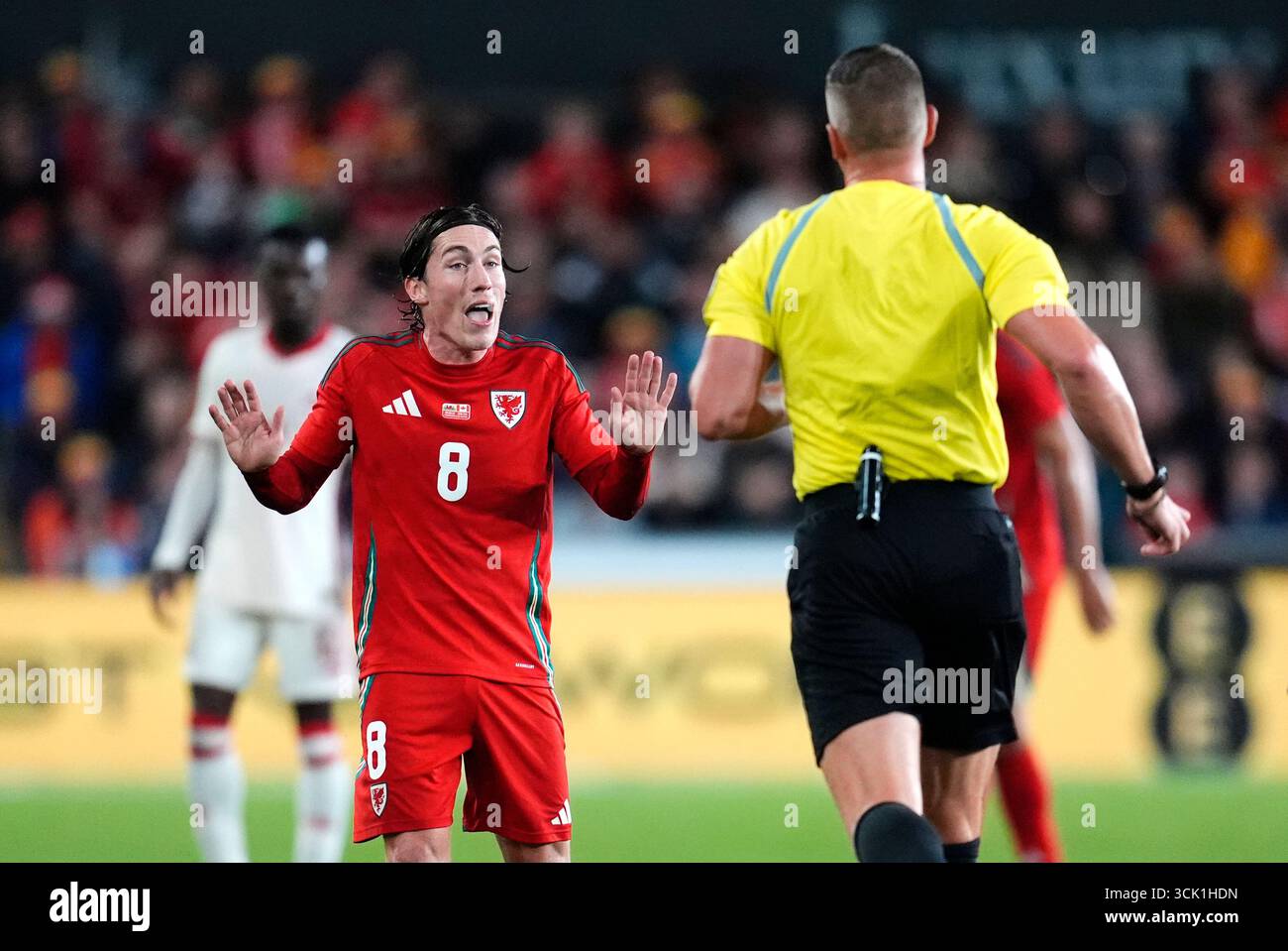 Wales' Harry Wilson appeals to referee Rob Jones during an ...