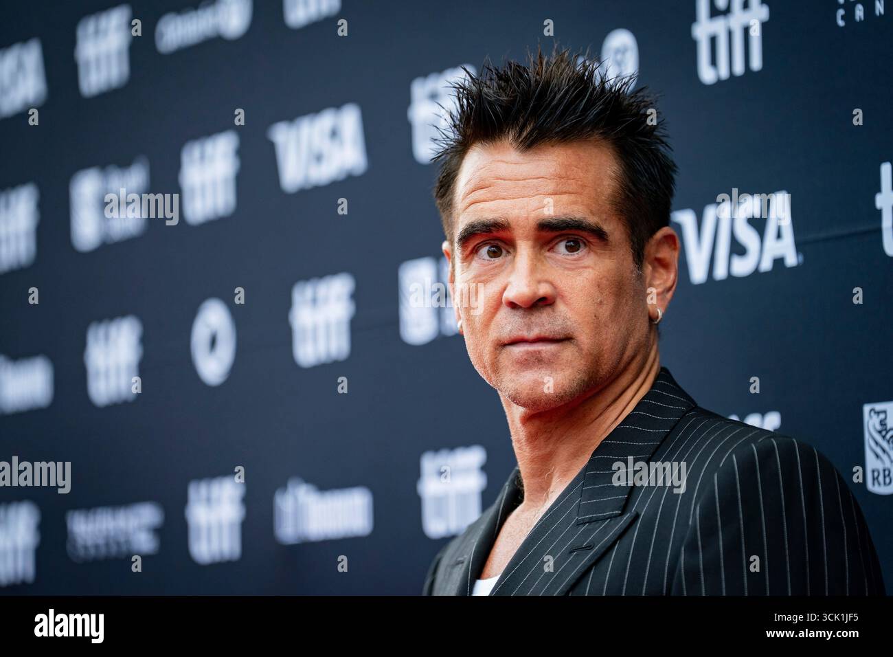 Colin Farrell walks the red carpet at the premiere of "Ballad of a ...