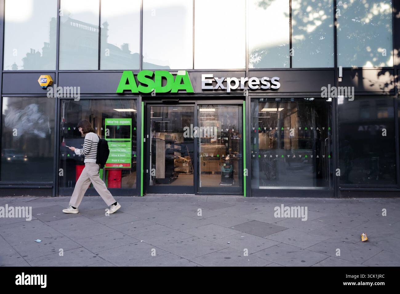 London, UK. 9th Sep, 2025. A lady seen walking next to the ASDA Express ...
