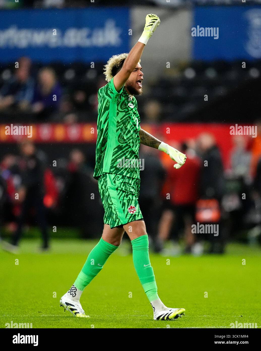 Canada goalkeeper Dayne St. Clair celebrates their side's first goal of ...