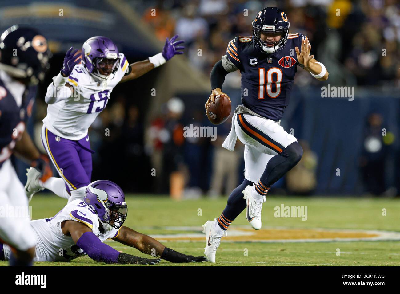 Chicago Bears quarterback Caleb Williams (18) runs with the ball during ...
