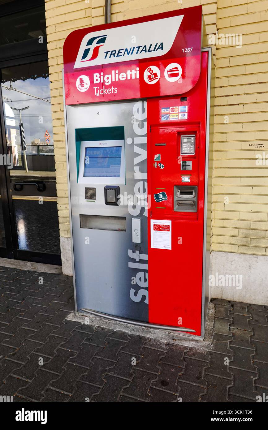 Self-service Trenitalia train ticket machine on platform outside train station, Monopoli, Italy ...