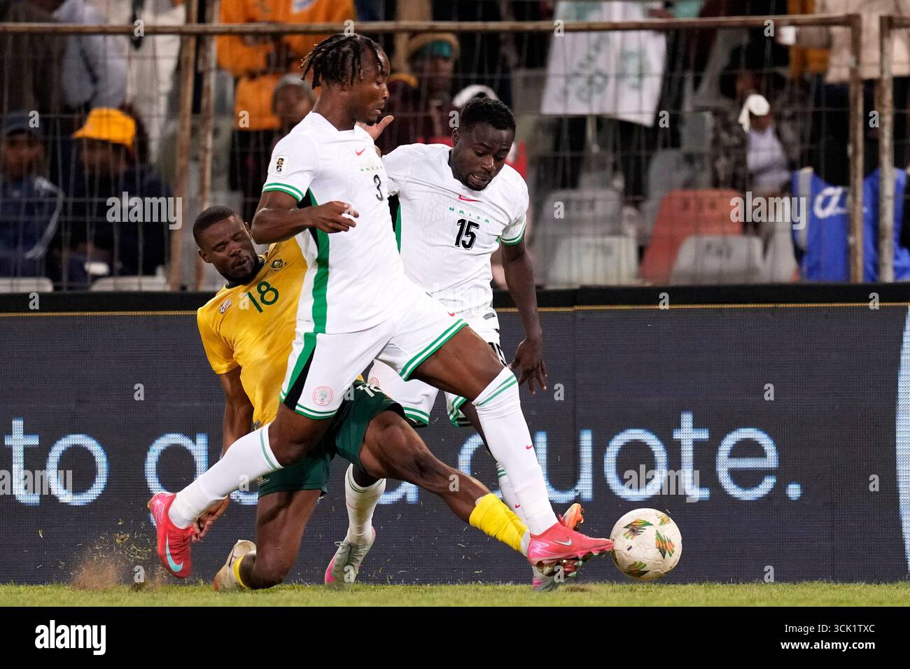 South Africa's Zuko Mdunyelwa, left, vies for the ball with Nigeria's ...