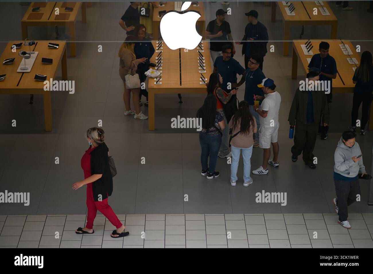 View of the Apple logo at an Apple retail store, New York, NY ...