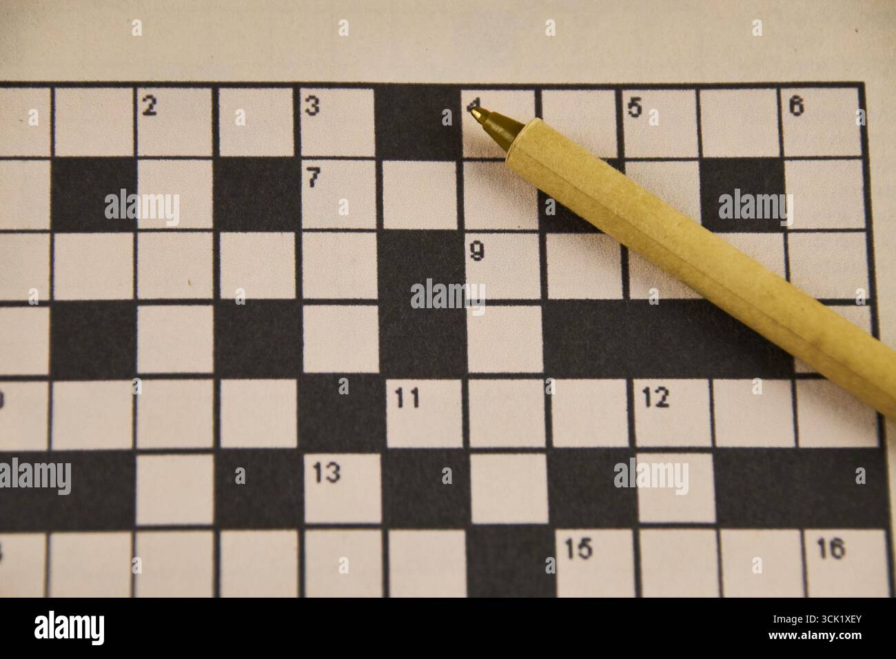 Close-up crossword puzzle, with no written content on a white ...