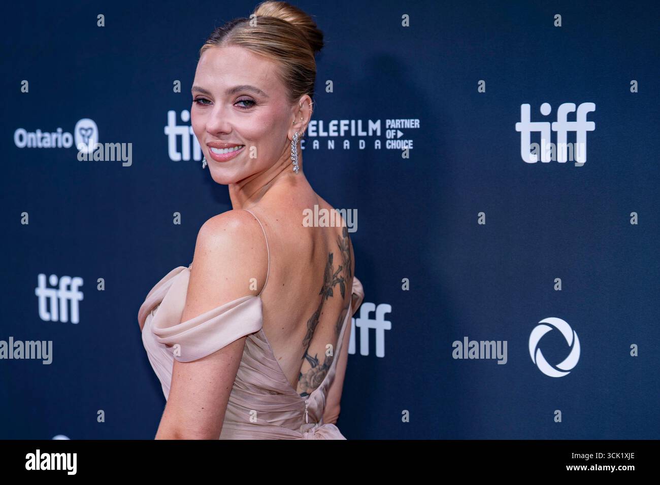 Scarlett Johansson walks the red carpet at the premiere of "Eleanor the Great" at the Toronto ...