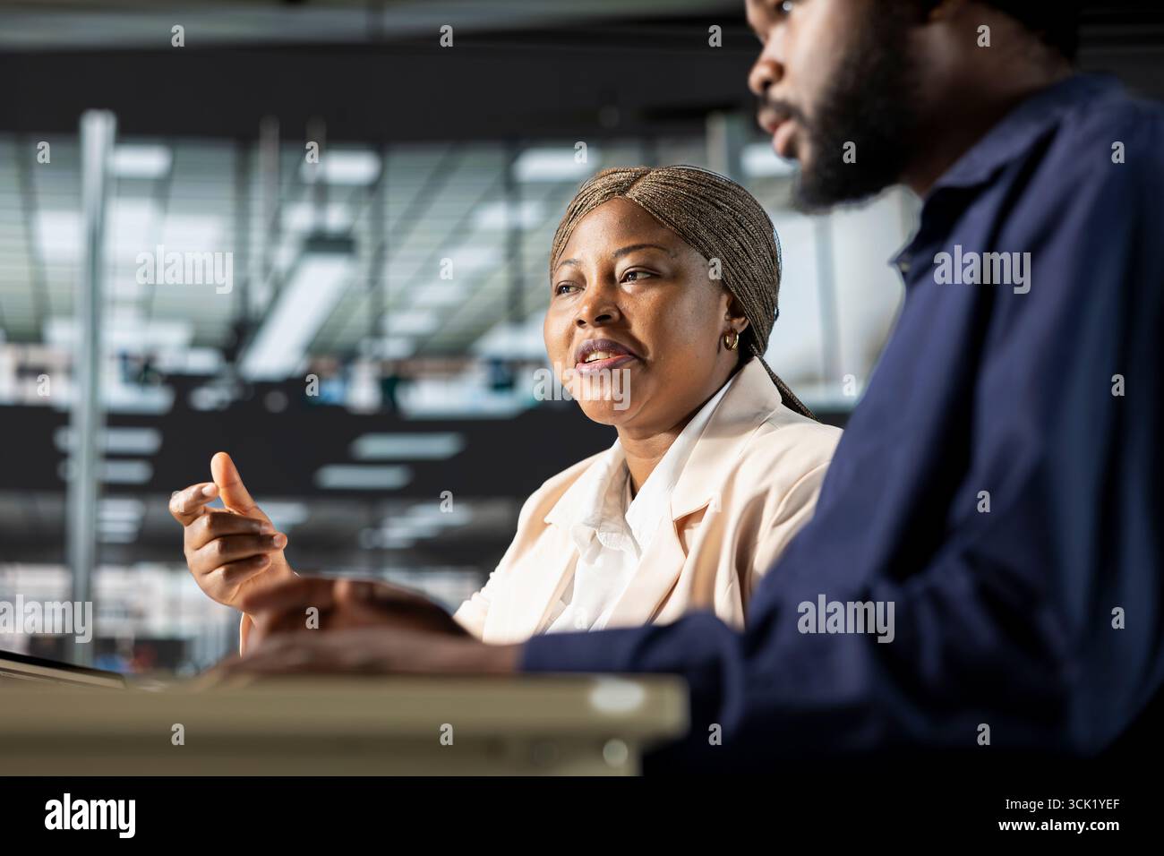 African american business staff studying online data for a presentation ...