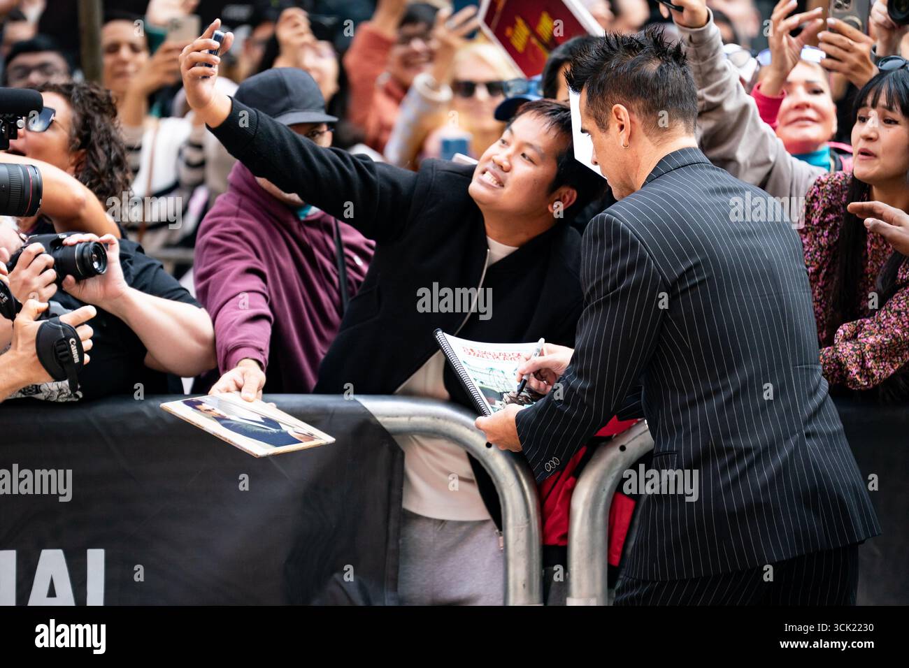 Colin Farrell interacts with fans prior to the red carpet at the ...