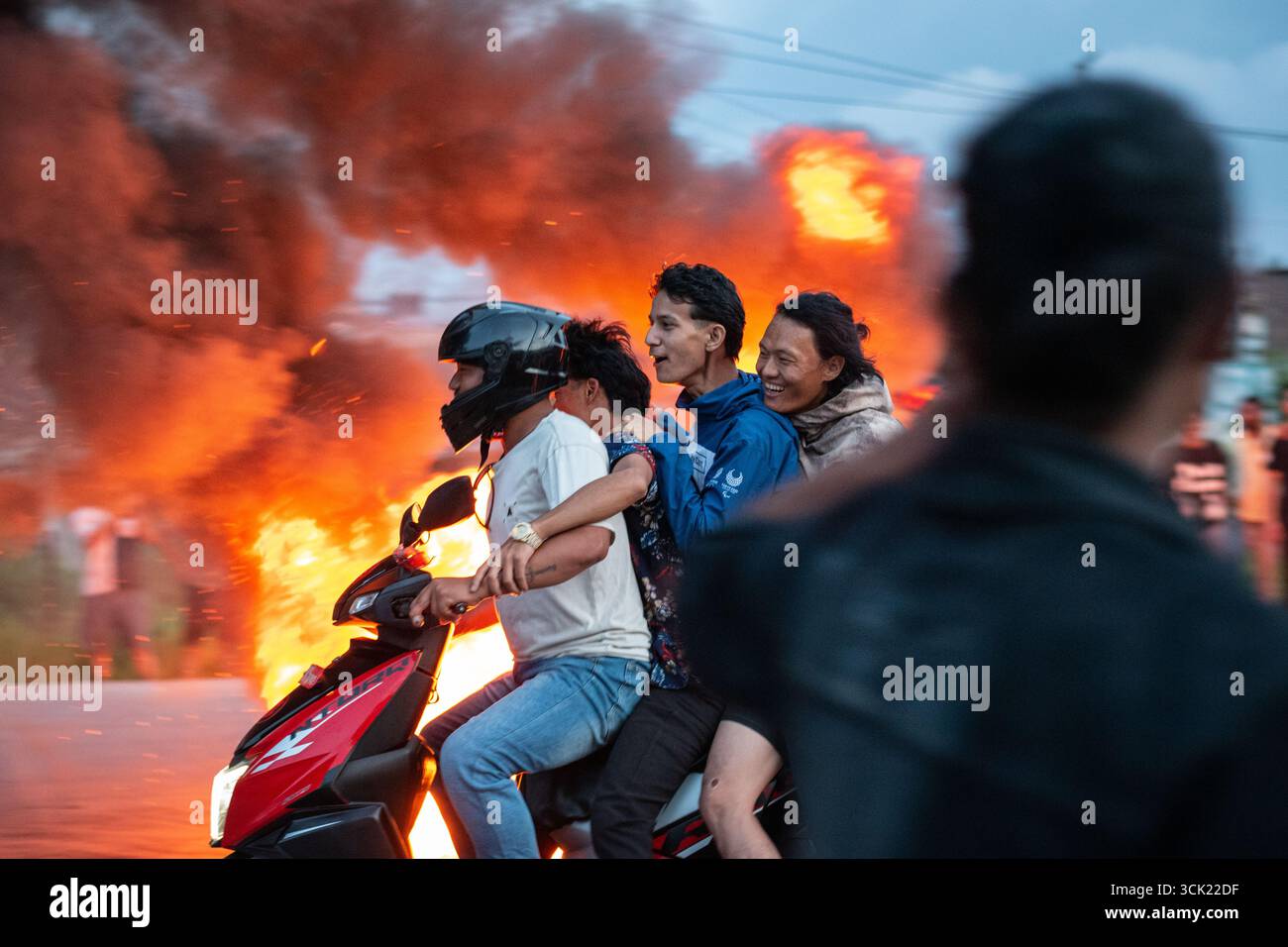 Kathmandu, Nepal – September 9, 2025: young protesters on a motorbike ...