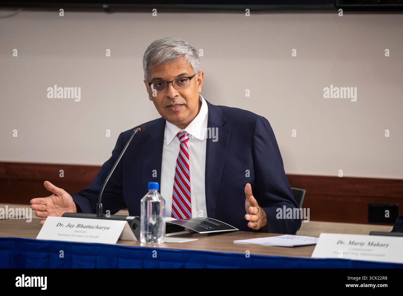National Institutes of Health Director Jay Bhattacharya speaks during a ...