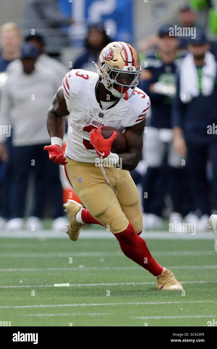 San Francisco 49ers running back Brian Robinson Jr. (3) carries the ...