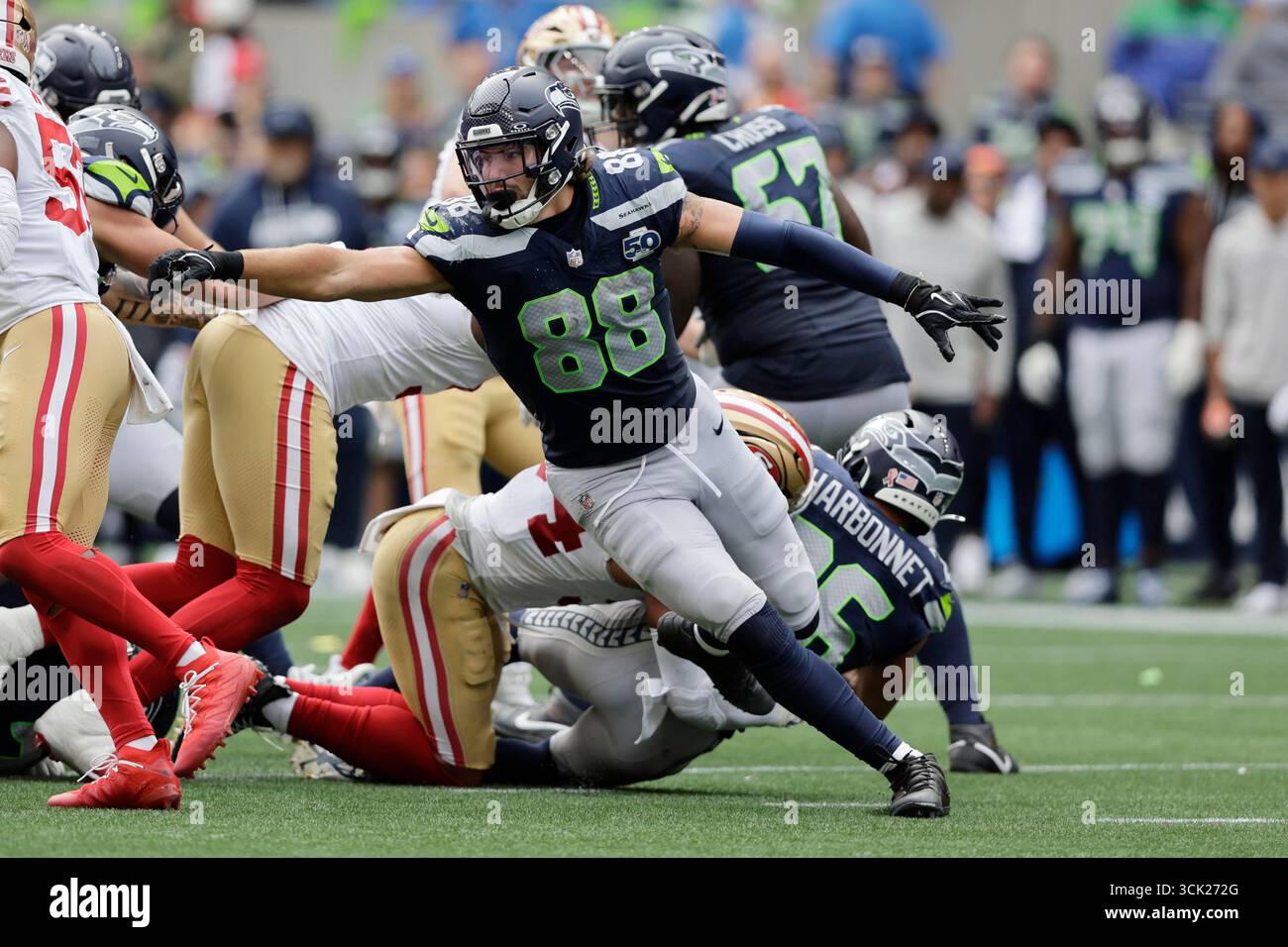 Seattle Seahawks tight end AJ Barner (88) runs during a play against ...