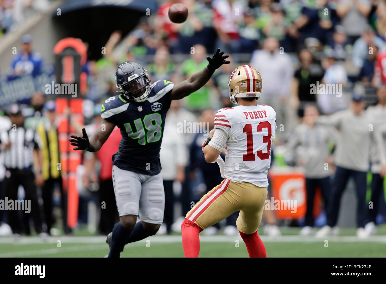 San Francisco 49ers quarterback Brock Purdy (13) throws a pass over ...