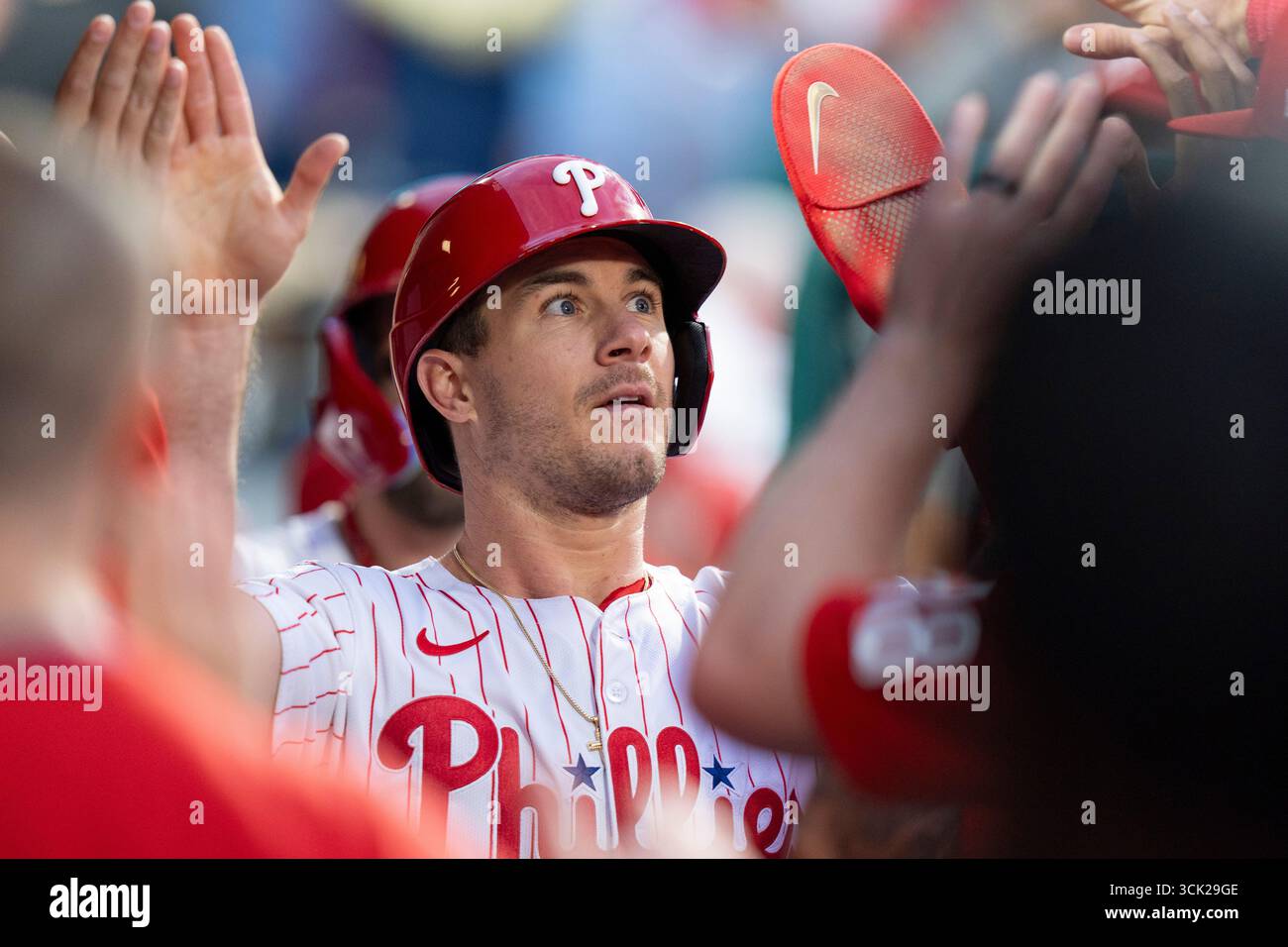 Philadelphia Phillies' J.T. Realmuto celebrates his run on the double ...