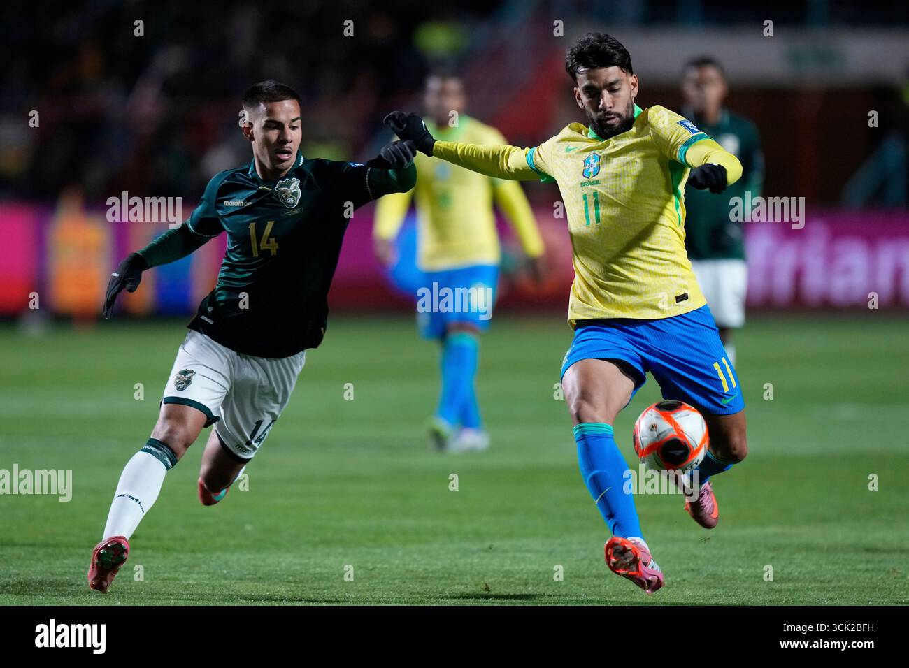 Brazil's Lucas Paqueta, right, and Bolivia's Robson Tome De Araujo ...