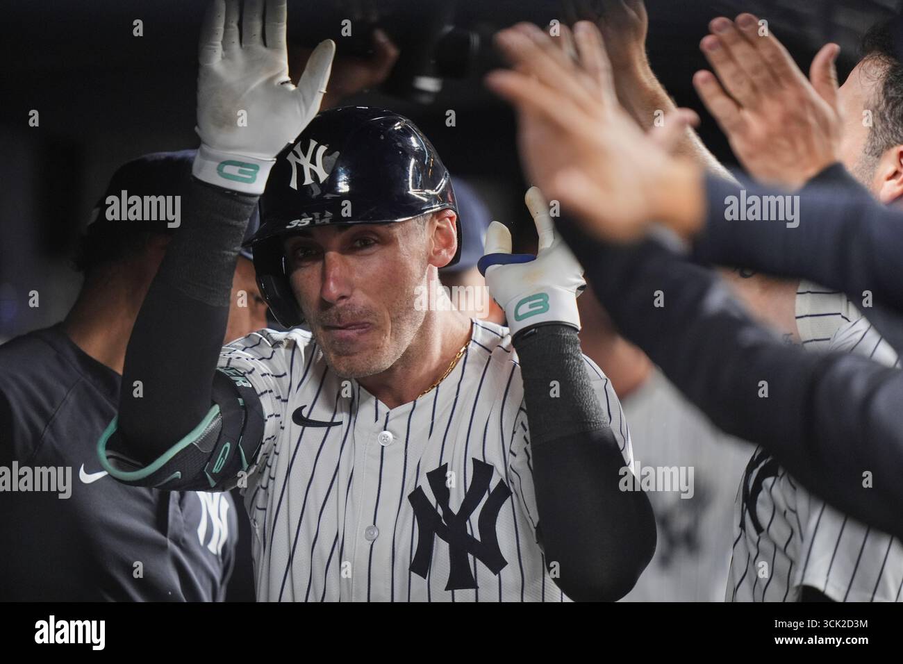 New York Yankees' Cody Bellinger celebrates with teammates after ...