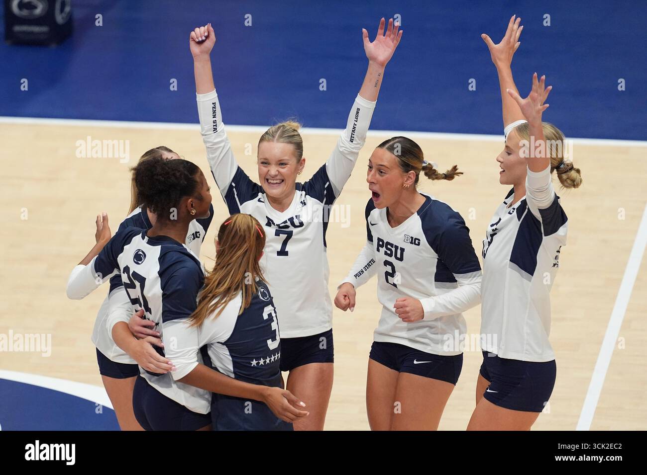 Penn State celebrates with outside hitter Alexis Ewing (27) during an ...