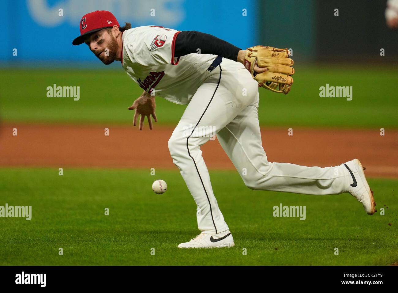 Cleveland Guardians second baseman Daniel Schneemann can't get to a ...