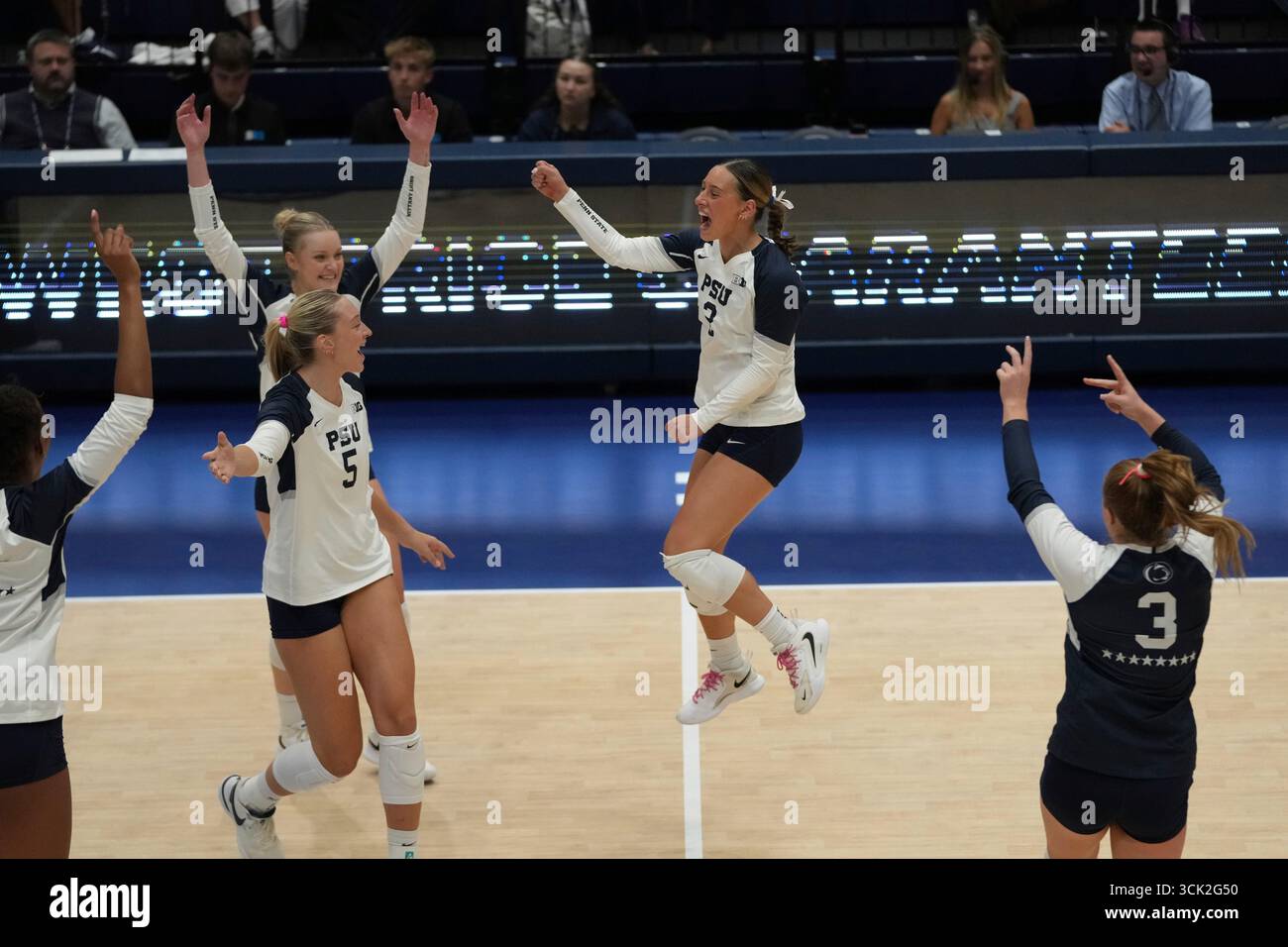Penn State's libero Ava Falduto, center, celebrates with teammates ...