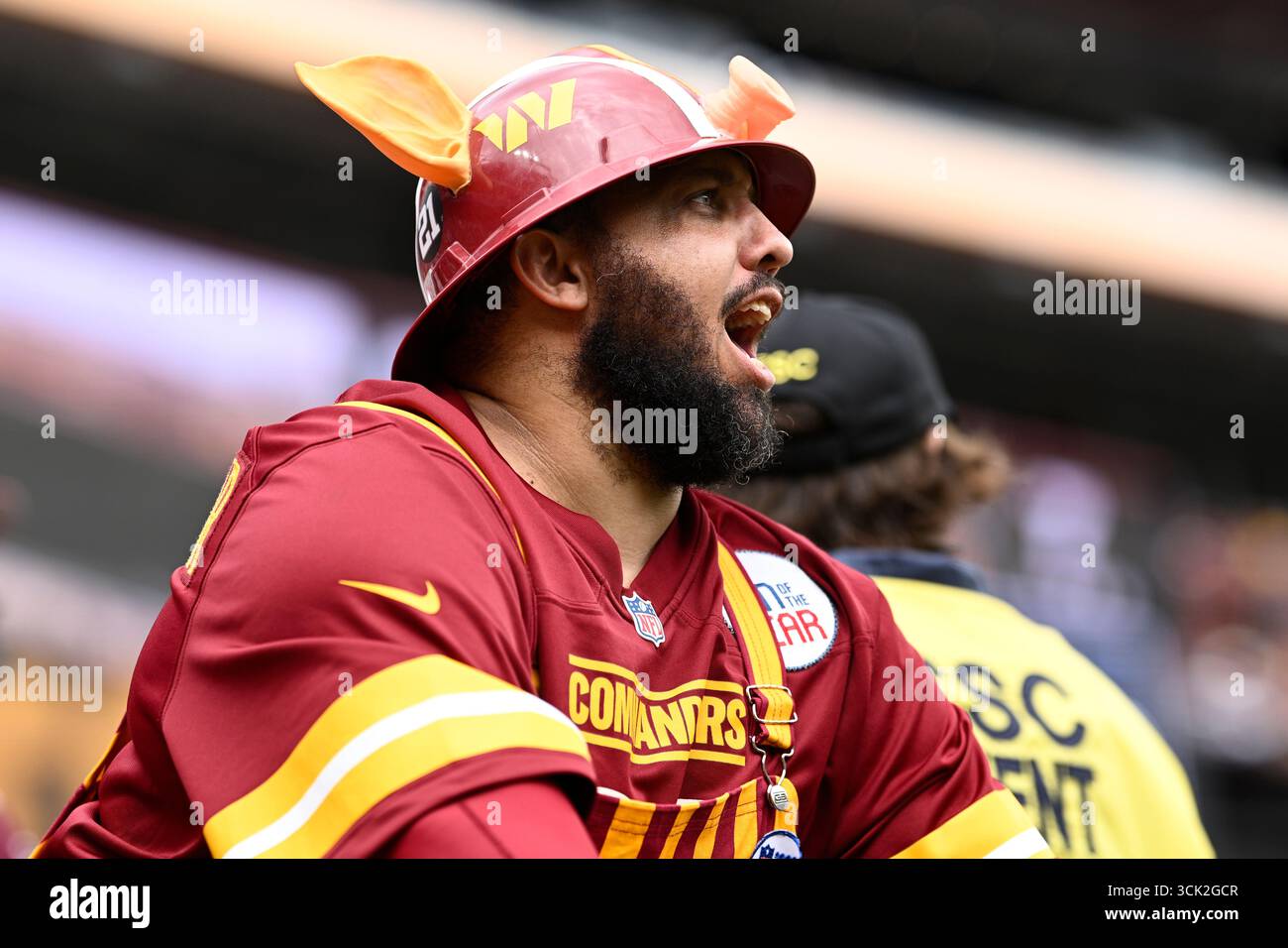 A spectator watches during an NFL football game between the Washington ...