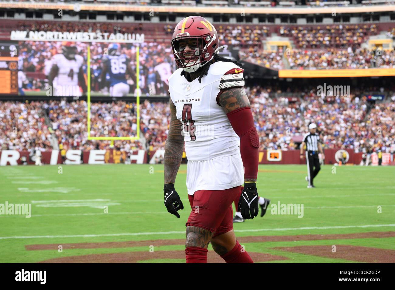 Washington Commanders linebacker Frankie Luvu (4) reacts during the ...