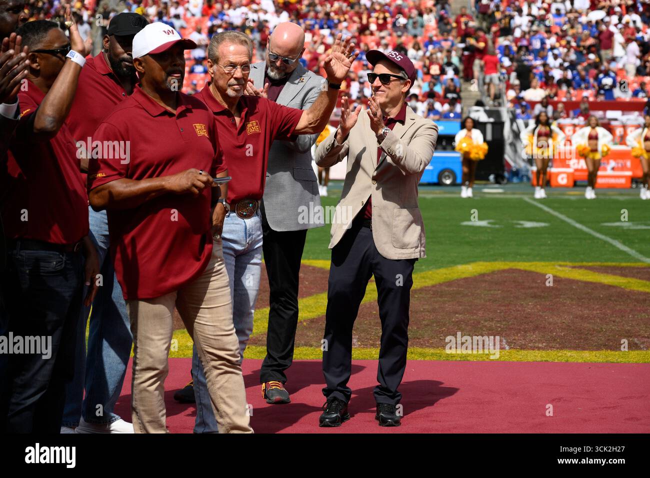 Washington Commanders managing partner John Harris, right, during a ...